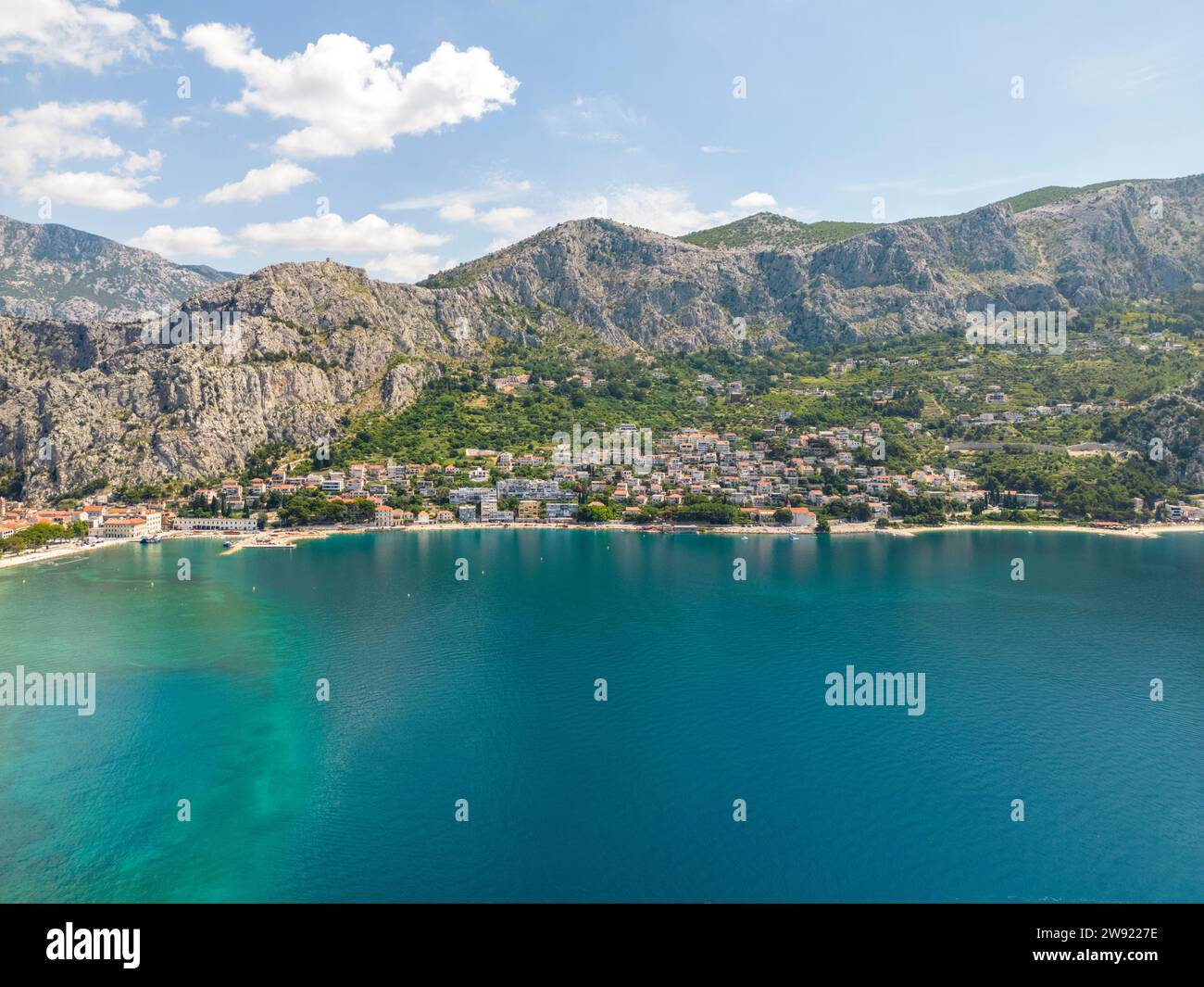 Croatia, Split-Dalmatia County, Omis, Aerial view of town on Cetina river and surrounding ...
