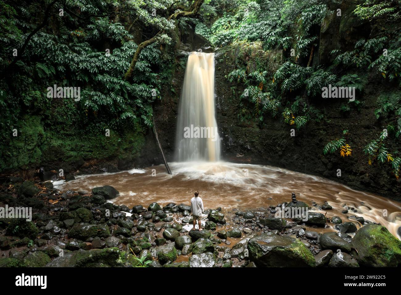 Young man waterfall hi-res stock photography and images - Alamy