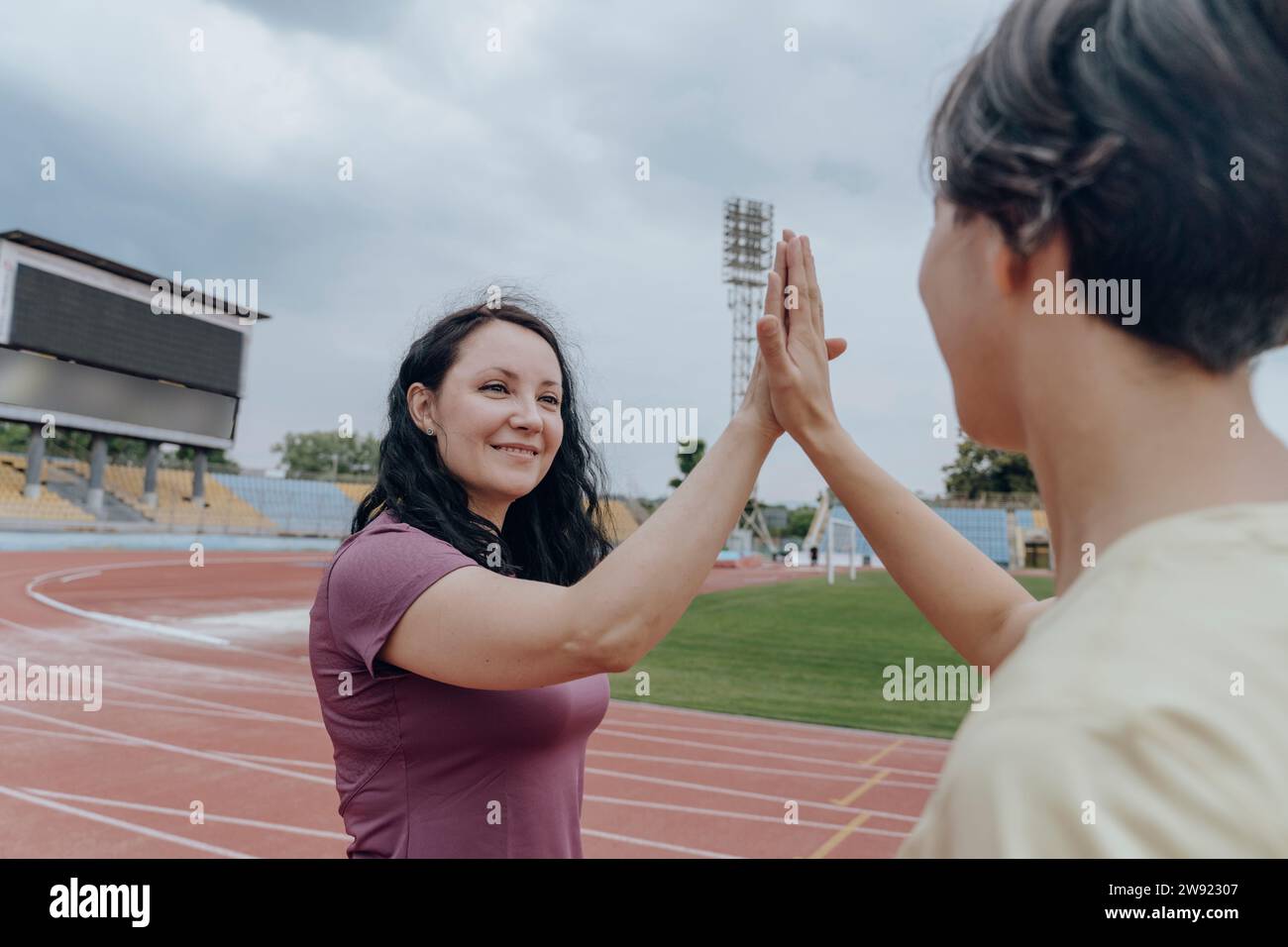 Mature women high five hi-res stock photography and images - Alamy