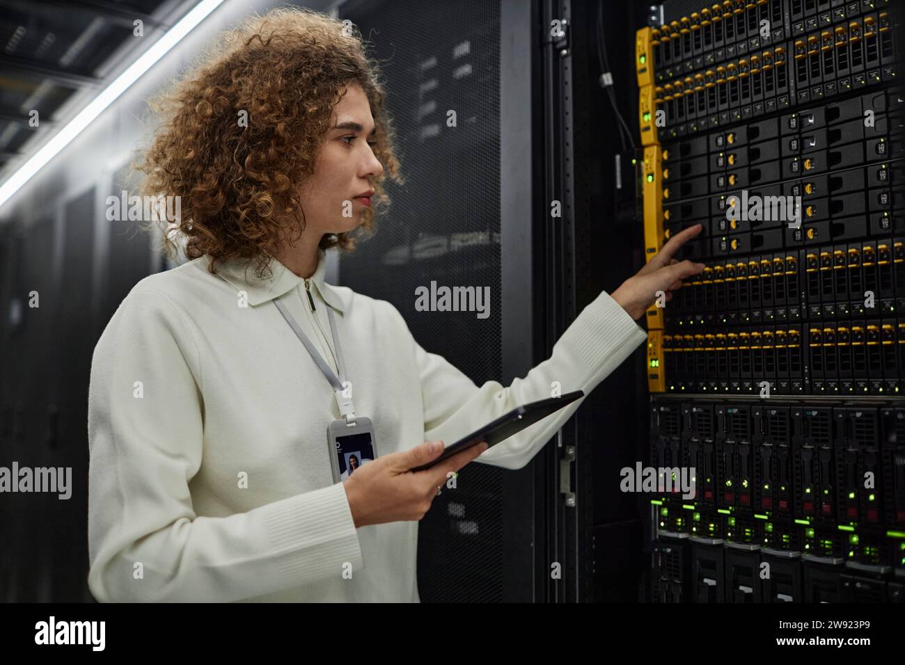 Technician checking supercomputer equipment in data center Stock Photo - Alamy