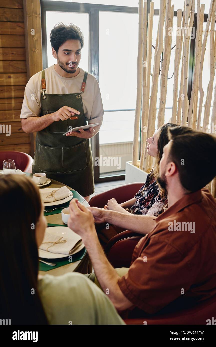 Man pointing at tablet food order hi-res stock photography and images ...