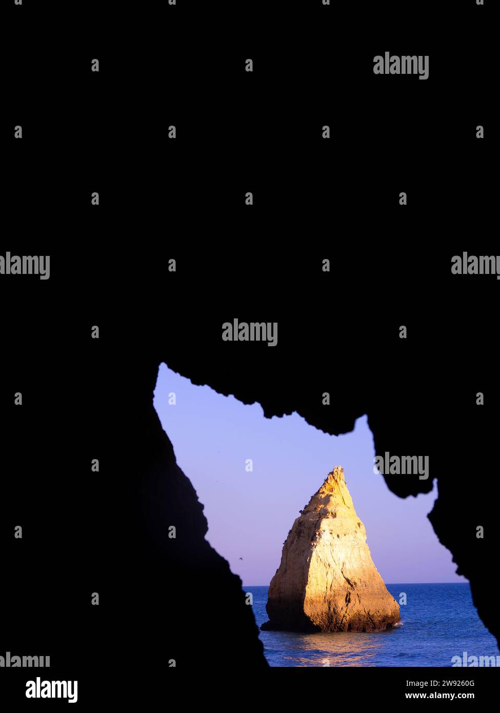 Portugal, Algarve, Cave and sea stack at Praia da Marinha Stock Photo ...