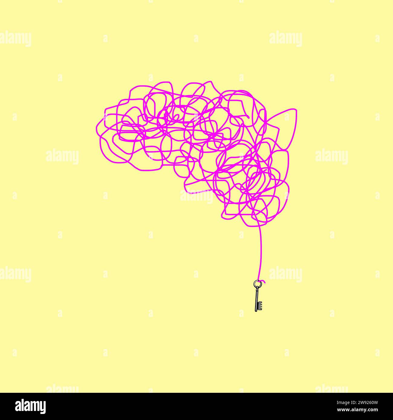Key at end of brain shaped tangled string Stock Photo - Alamy