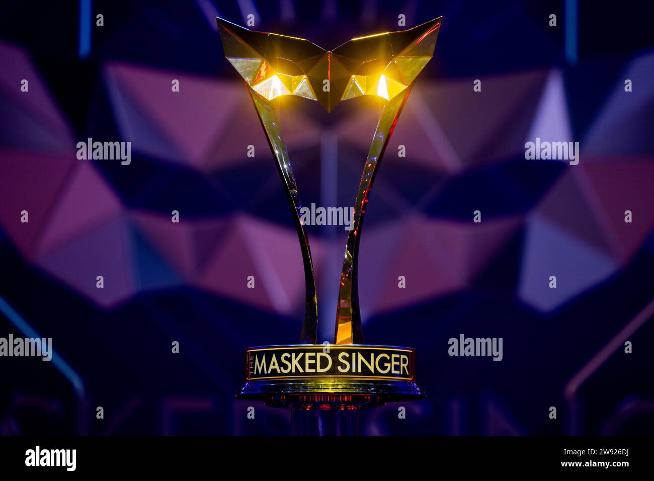 Cologne, Germany. 23rd Dec, 2023. The winner's trophy is presented on ...