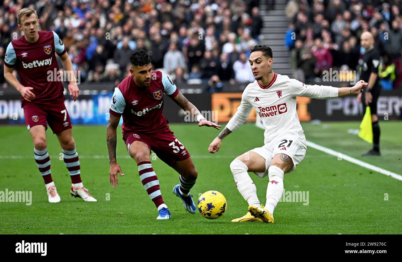 London, UK. 23rd Dec, 2023. Emerson of West Ham Utd battles for the ...