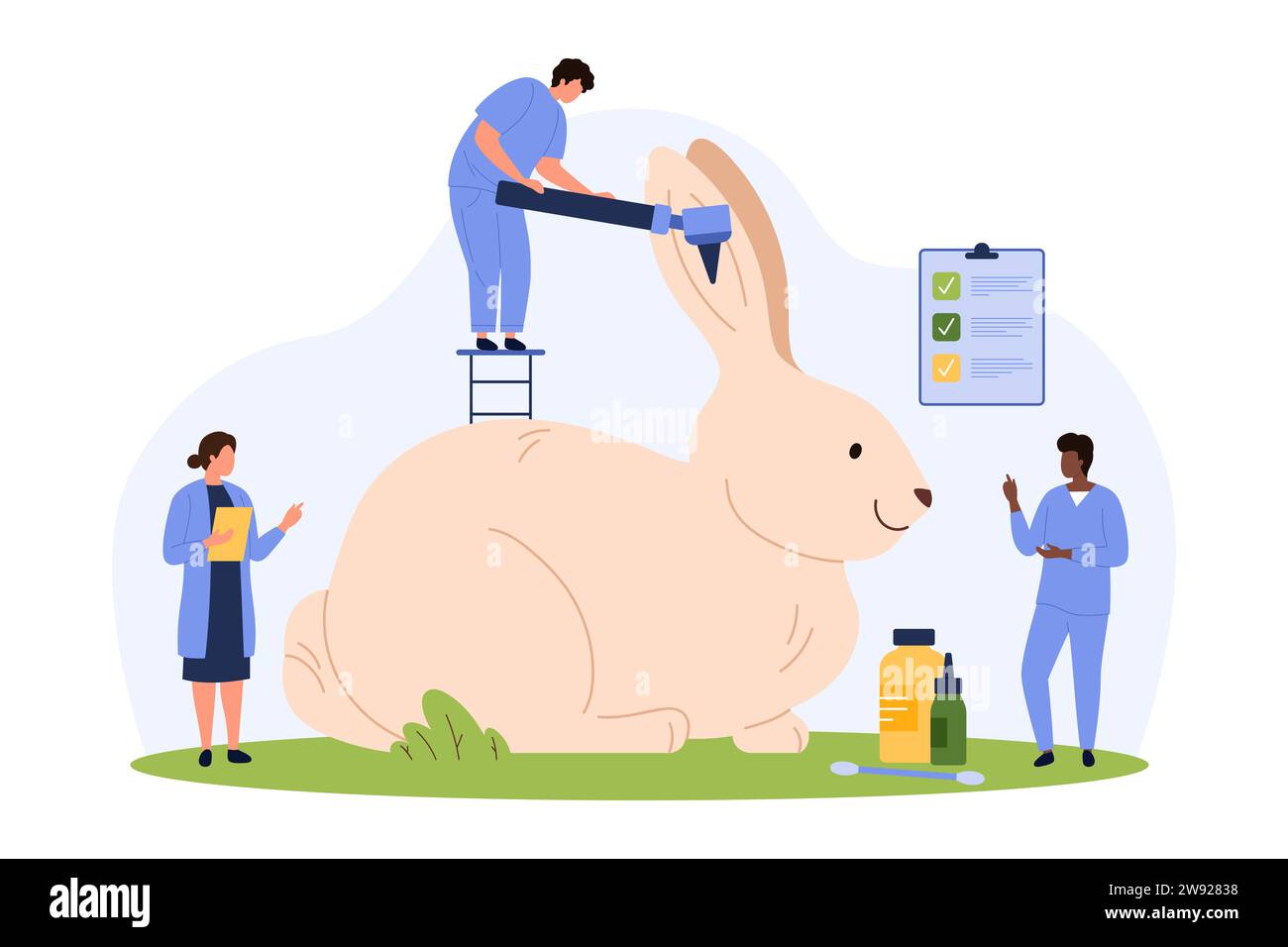 Rabbit at veterinarians appointment for examination. Tiny people check ...