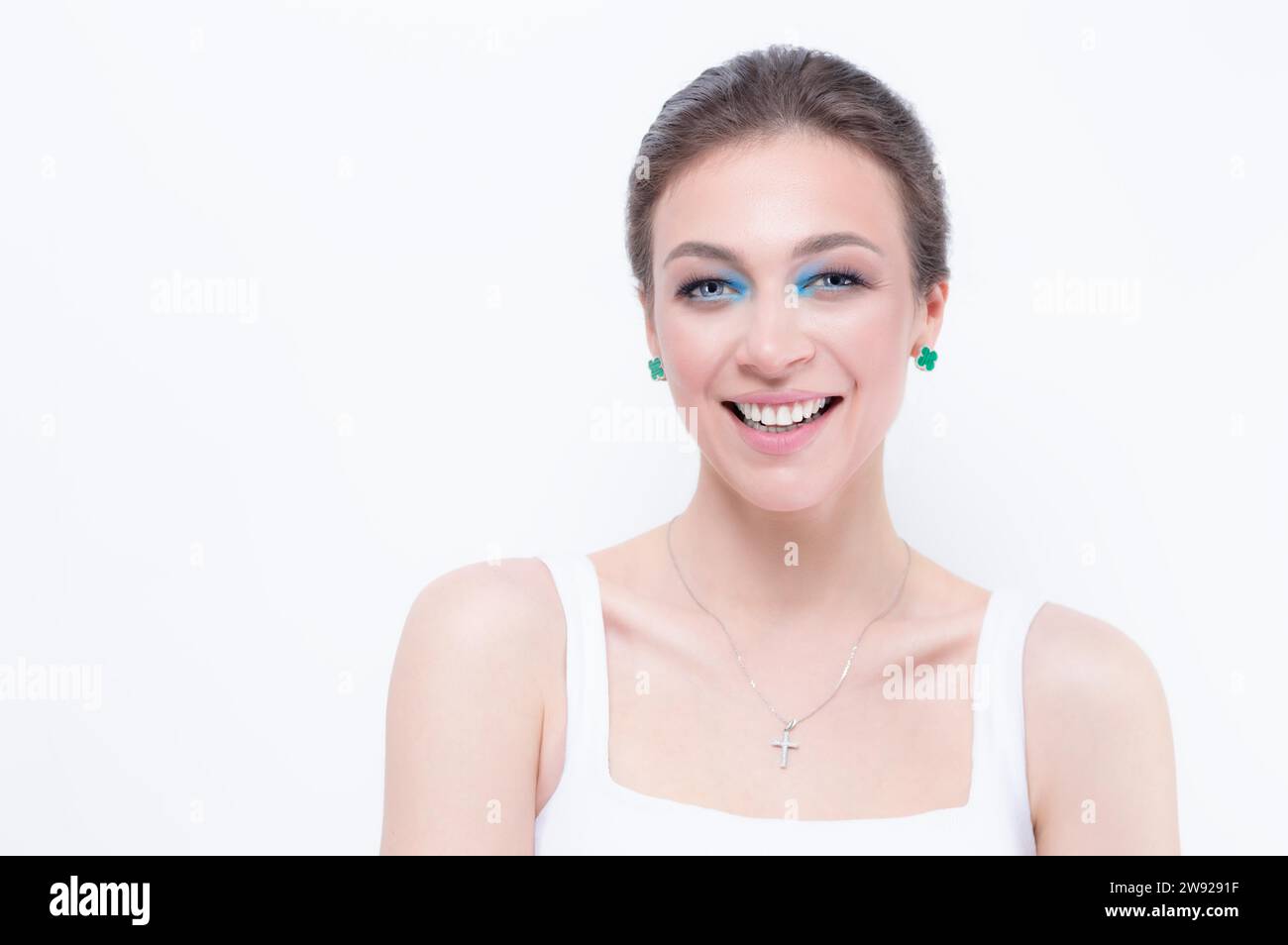 Portrait of a beautiful girl with a defiant make-up. White background ...
