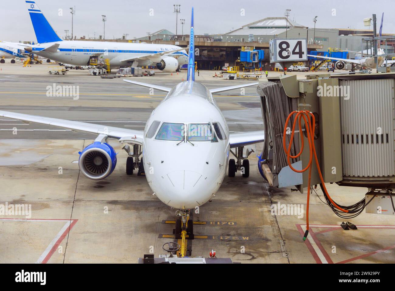 At boarding gate bridge ground services are providing services to ...