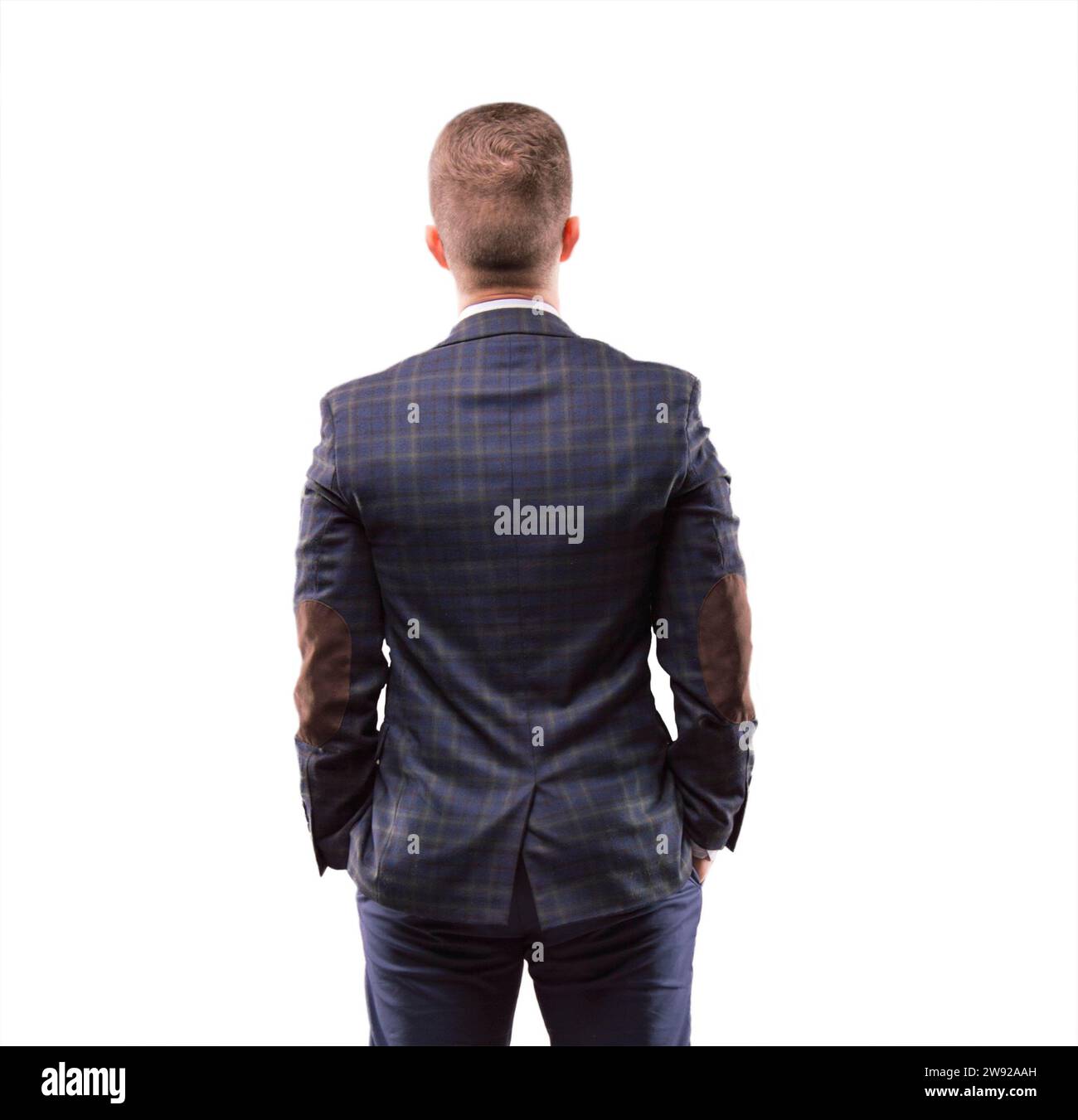 Man stands with his back to the camera and looking at something Stock ...