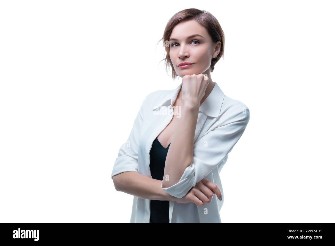 Portrait of stylish adult woman posing in studio over white background ...