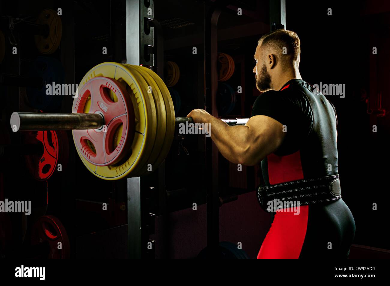 One knee squat hi-res stock photography and images - Alamy