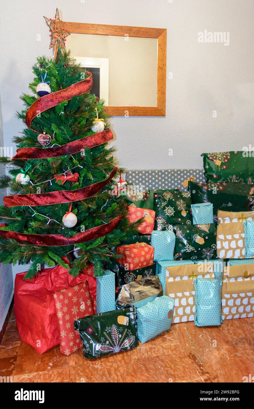 Big beautiful Christmas tree decorated with beautiful shiny ornaments ...