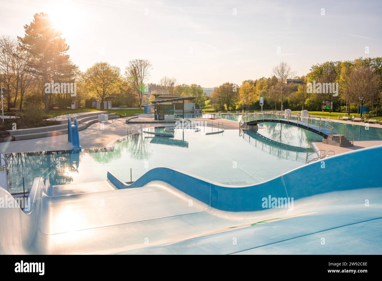 Impressive drone view of a swimming pool surrounded by fog in the first ...