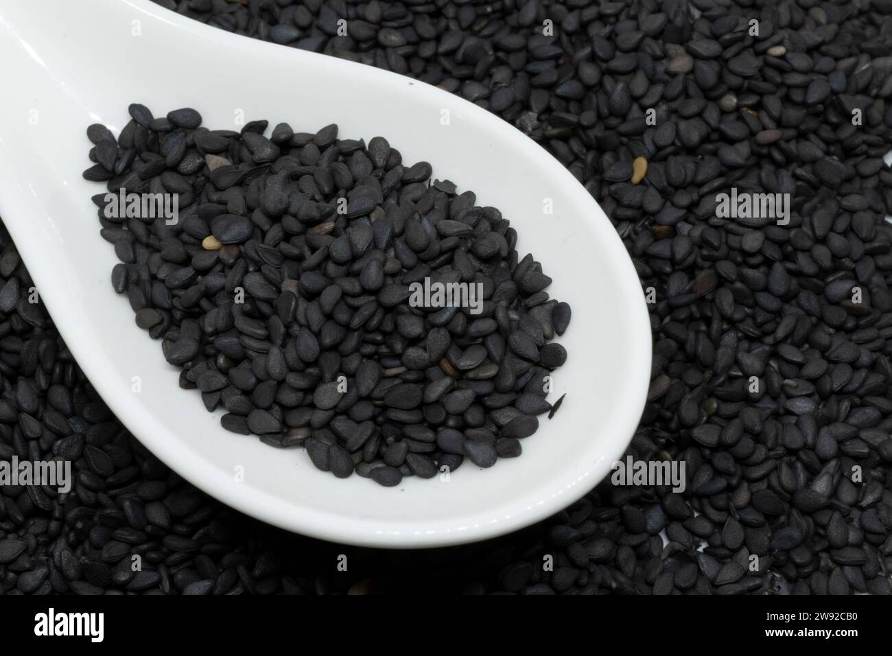 black sesame seeds Stock Photo - Alamy