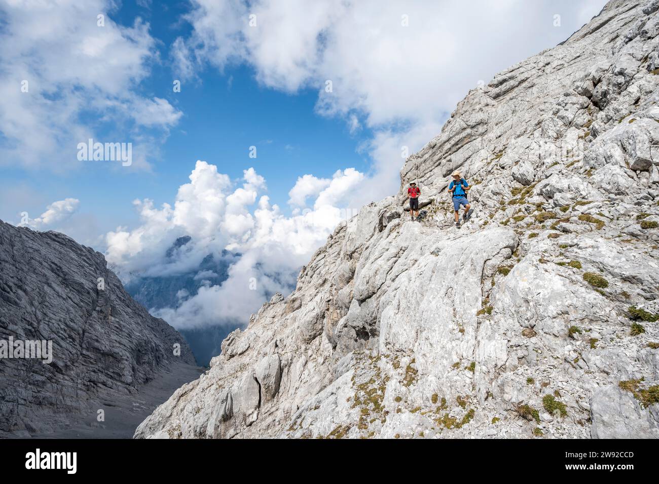 Mountaineer on a steep rocky path, descent to the Ofentalscharte ...