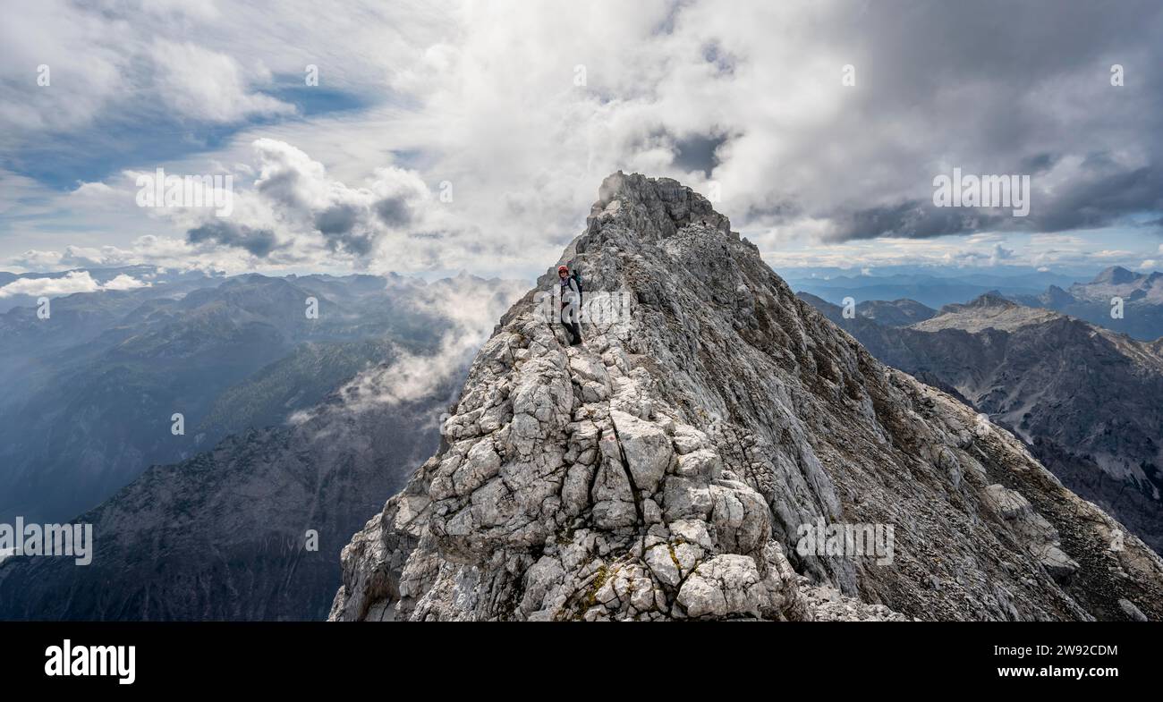 Mountaineer on a narrow rocky ridge, Watzmann crossing to Watzmann ...