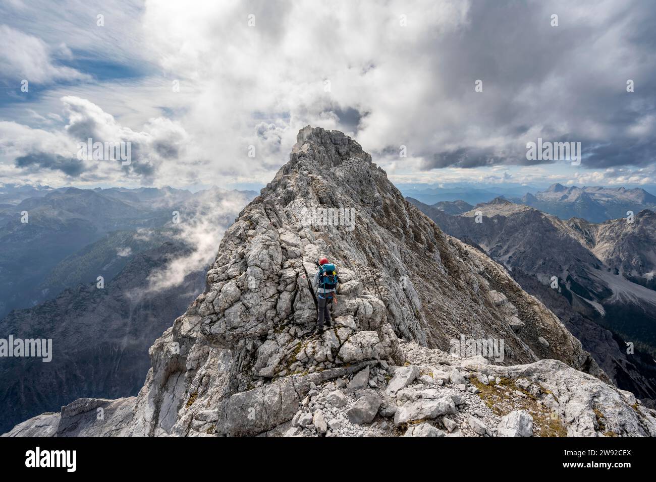 Mountaineer on a narrow rocky ridge, Watzmann crossing to Watzmann ...
