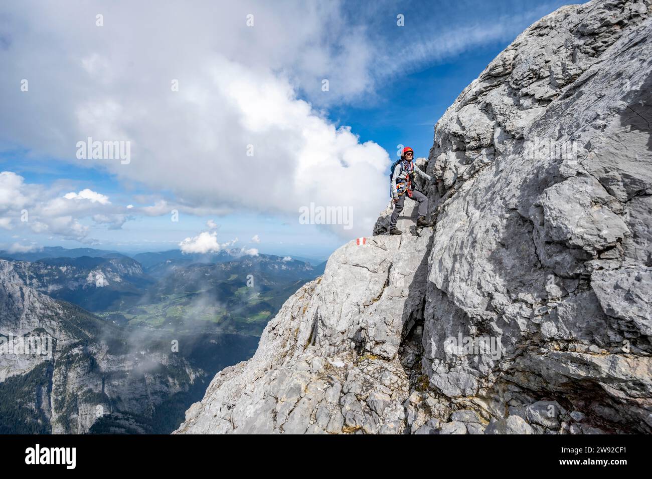 Mountaineer on a narrow rocky mountain path, Watzmann crossing to the ...