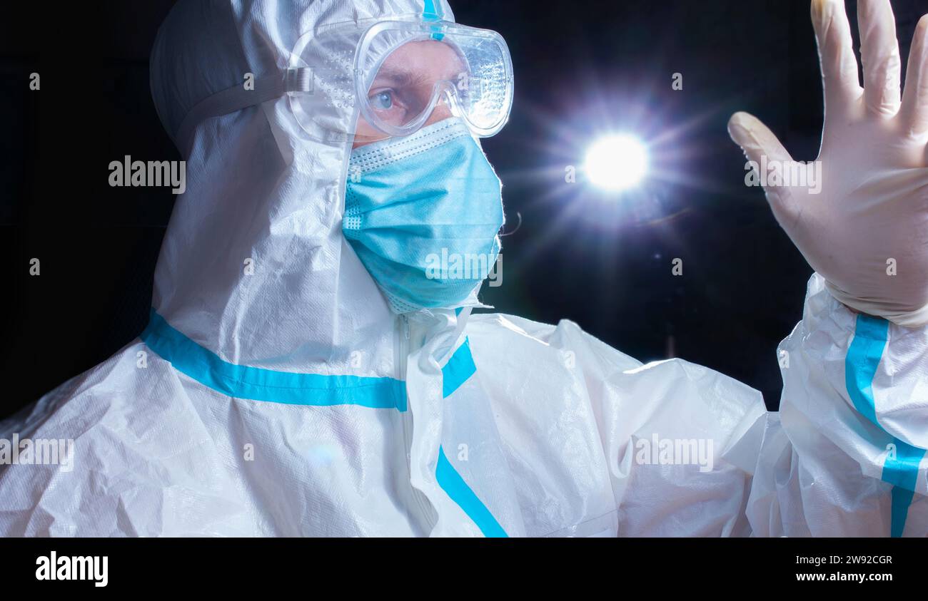 Doctor laboratory assistant in personal protective equipment against ...