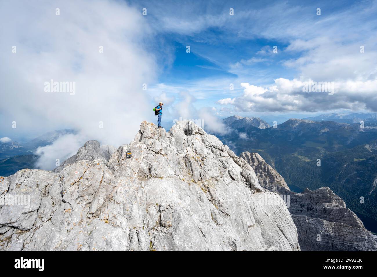 Mountaineer on a narrow rocky ridge, Watzmann crossing to the Watzmann ...