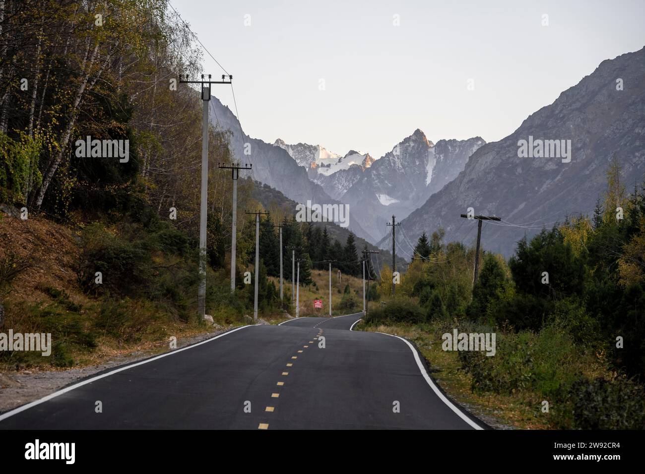 Road in the Ala Archa valley, glaciated mountain peaks in the ...