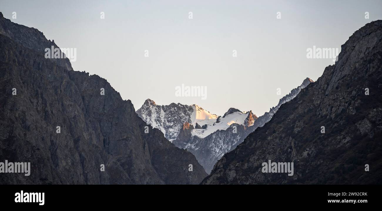Glaciated mountain peak at sunset, Ala Archa National Park, Khirgiz Ala ...