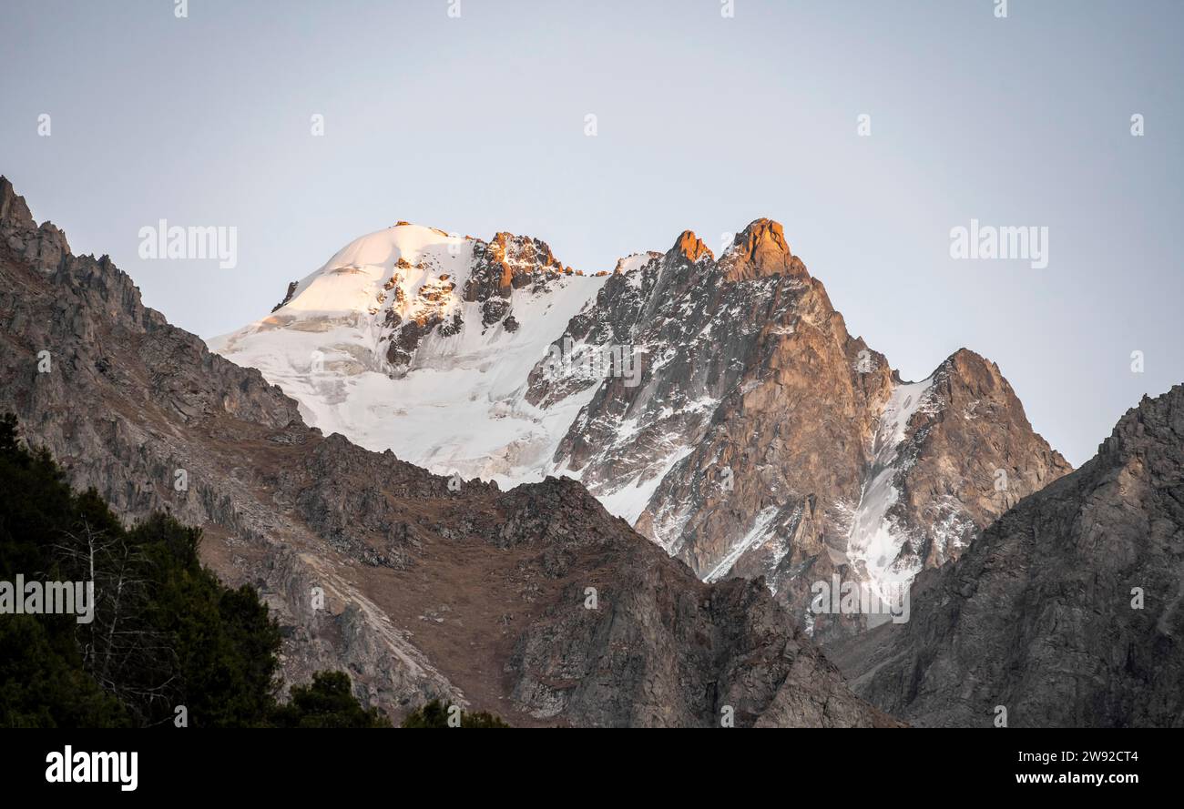 Glaciated mountain peak at sunset, Ala Archa National Park, Khirgiz Ala ...