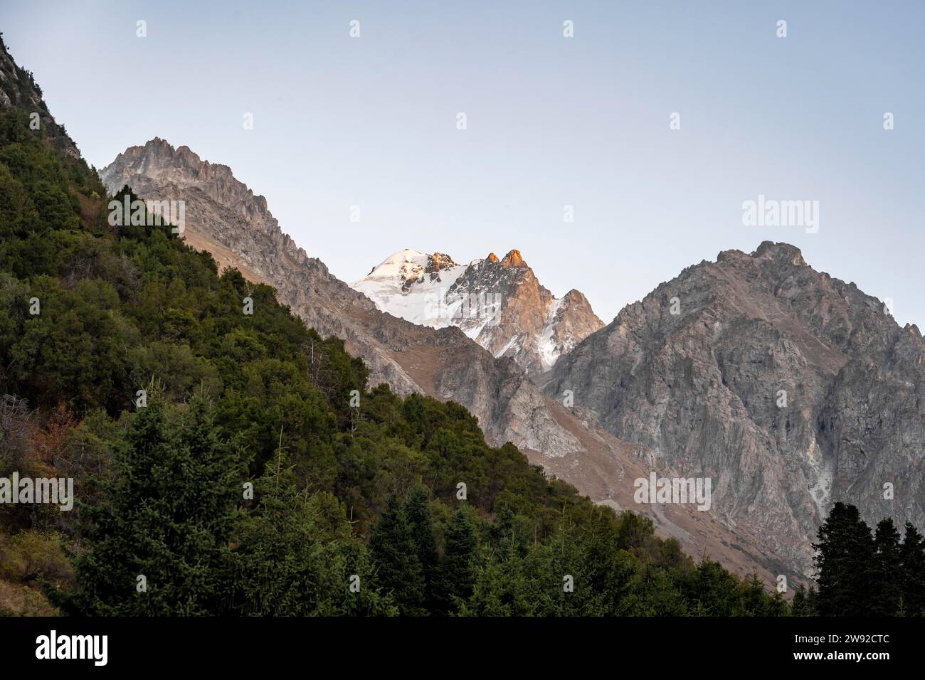 Glaciated mountain peak at sunset, Ala Archa National Park, Khirgiz Ala ...