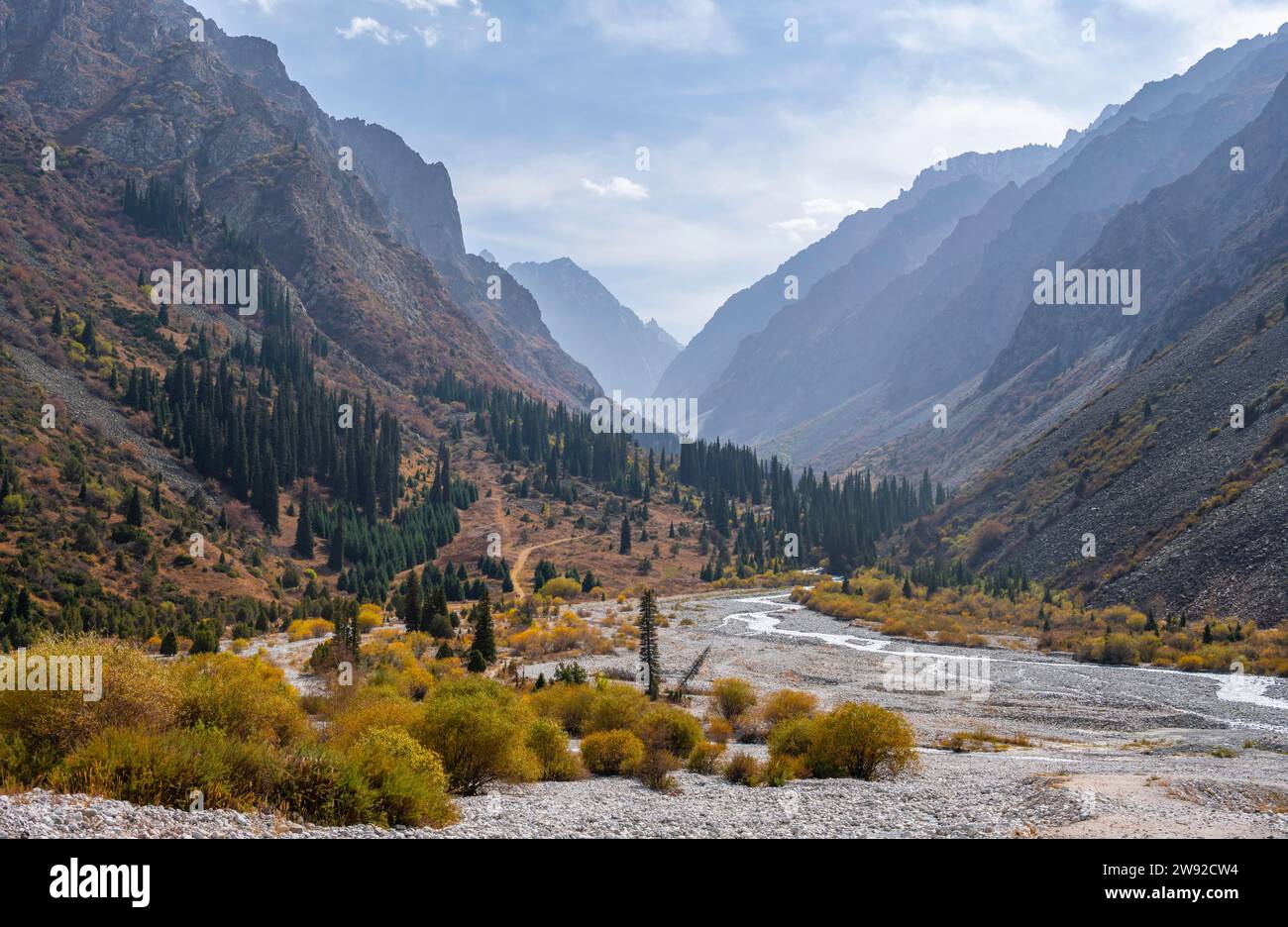 Mountain stream Ala Archa flows through the Ala Archa valley, autumnal ...