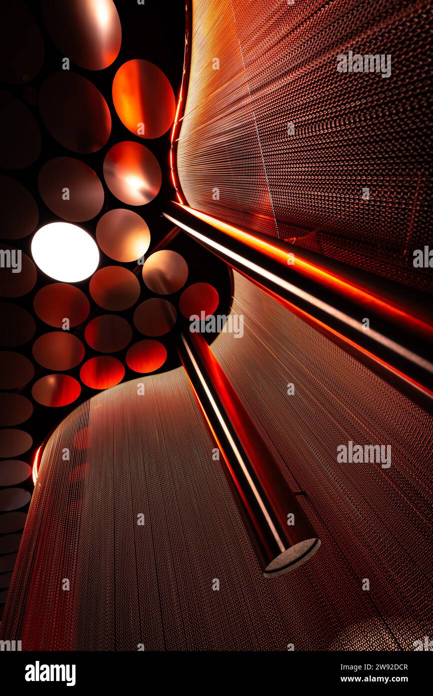 Close-up of a red light installation with spheres and reflections ...