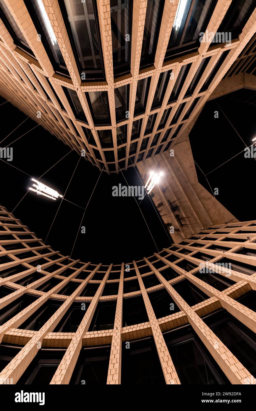 Night view of a circular courtyard with lighting and a view of the ...