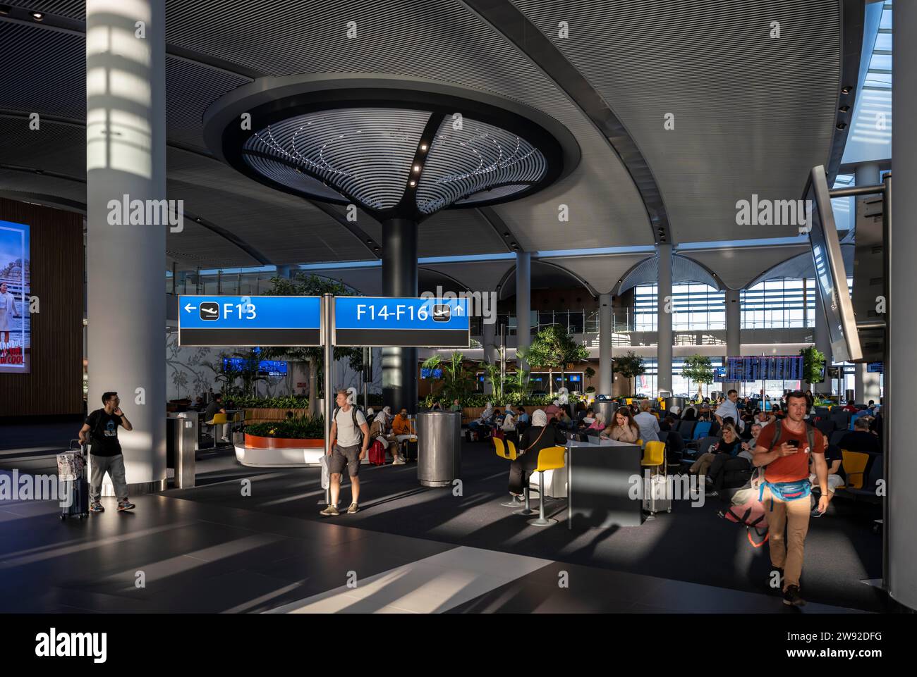 People in the waiting area, waiting hall at the gates, Istanbul Airport ...