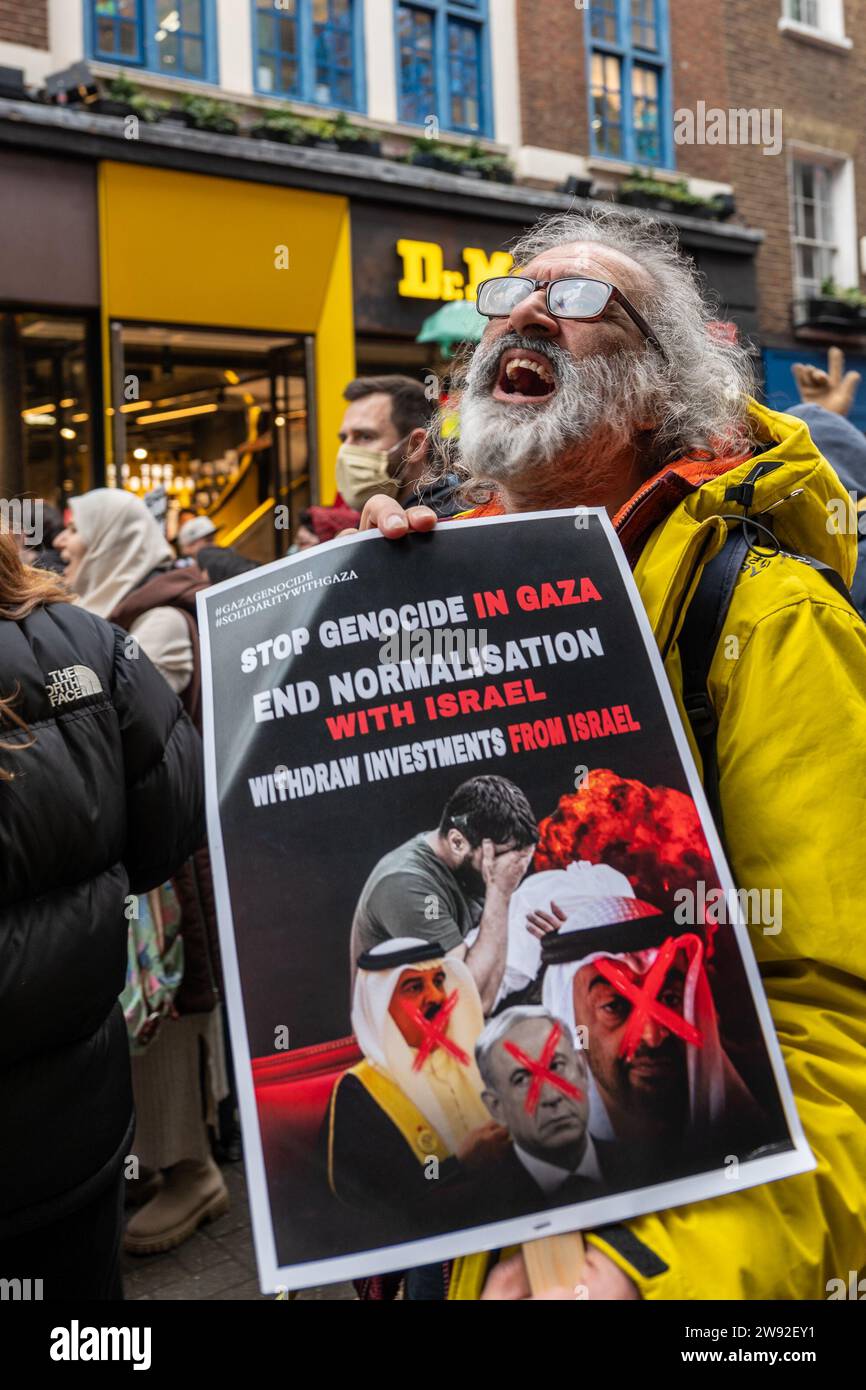 London / UK 23 DEC 2023. Hundreds of people demonstrated in Carnaby ...
