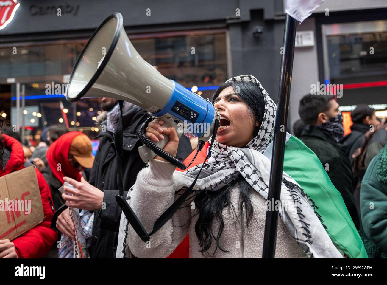 London / UK 23 DEC 2023. Hundreds of people demonstrated in Carnaby ...