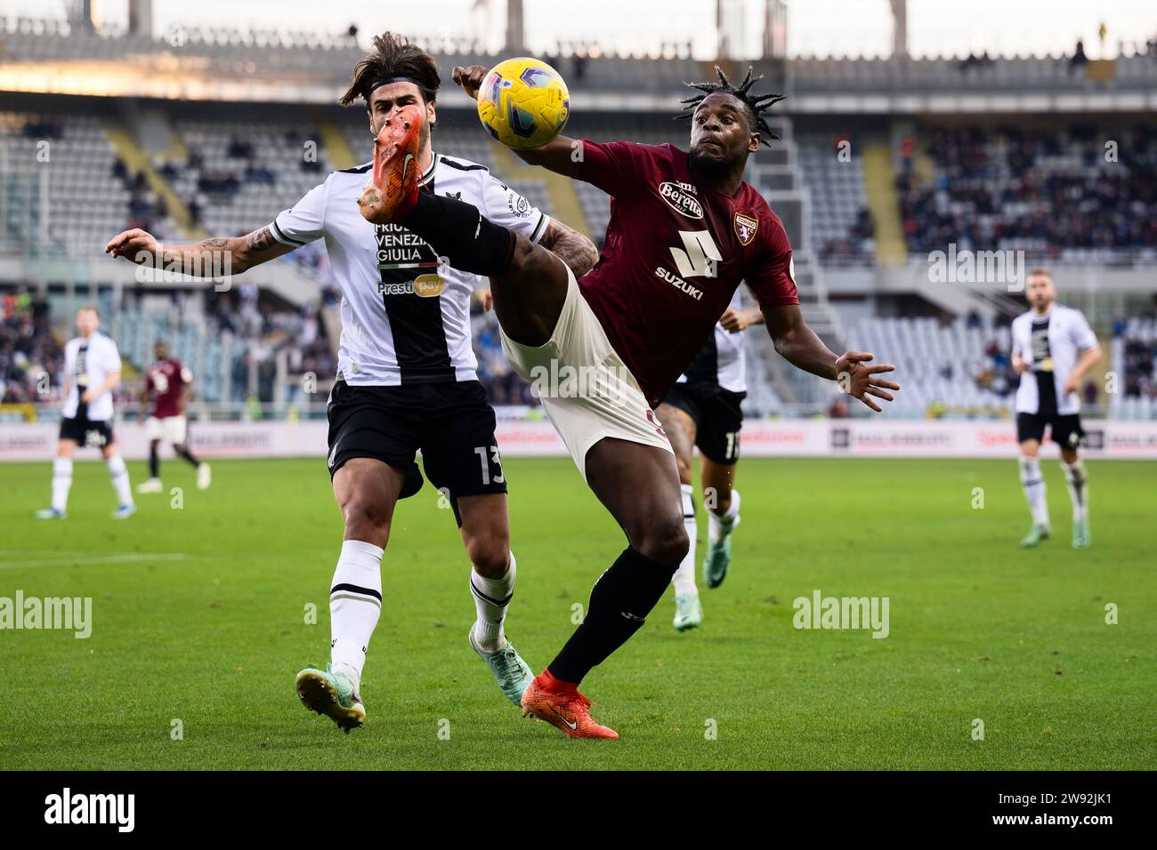 Turin, Italy. 23 December 2023. Duvan Zapata of Torino FC competes for ...