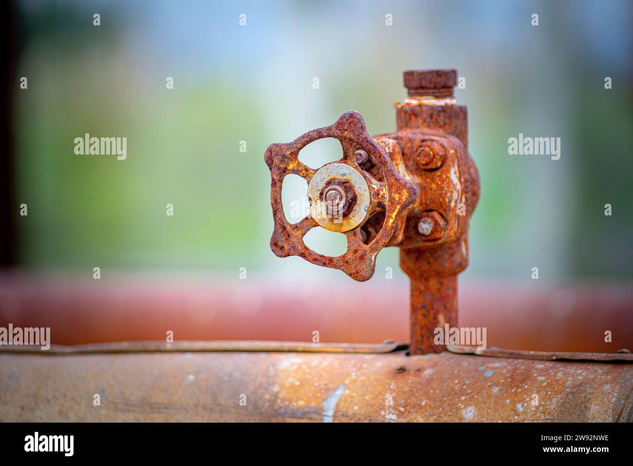 old and rusty faucet of obsolete chemical industrial equipment Stock ...