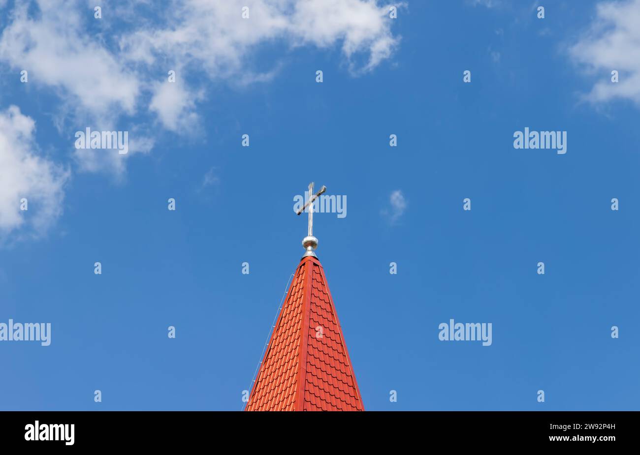 catholic christian cross on a blue sky background, catholic cross on a ...