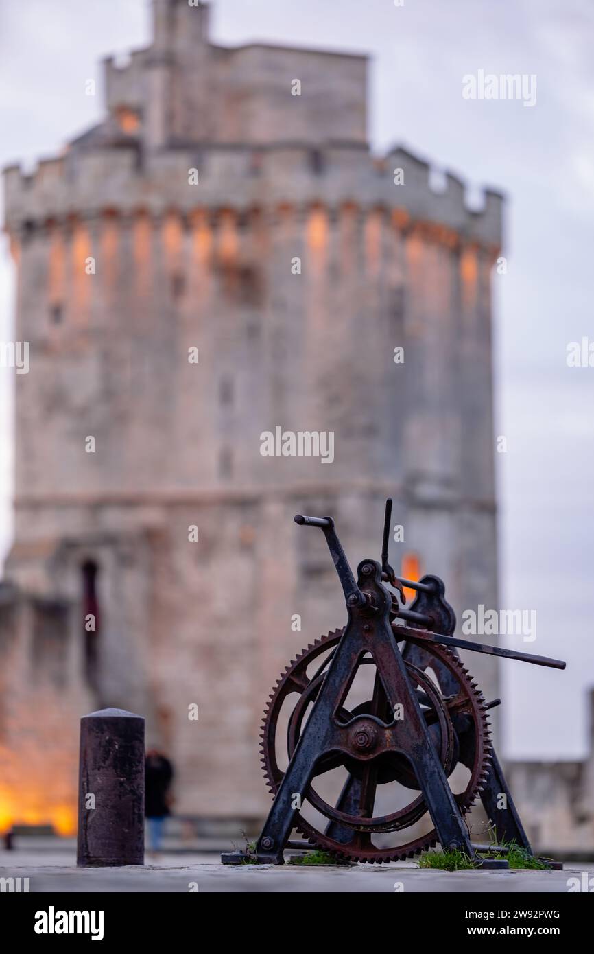 old rusty metal gear wheel in the port of la rochelle. it stands in ...