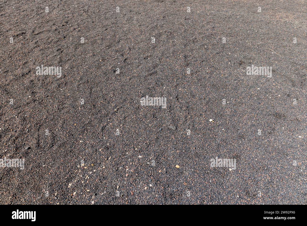 part of a walkway sprinkled with small rubble and stones, an ecological ...