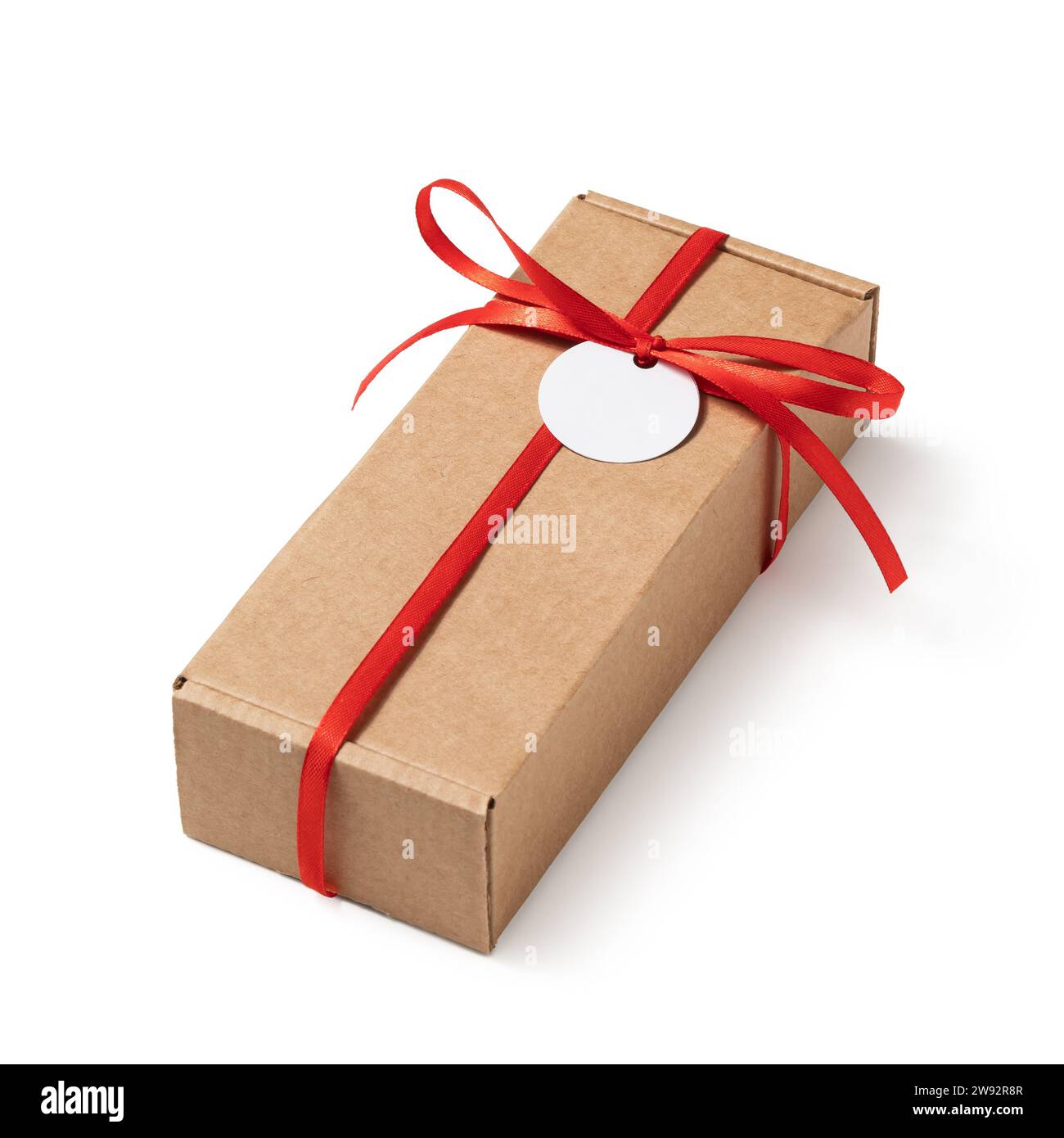 Closed cardboard box tied with decorative red ribbon, isolated on white ...