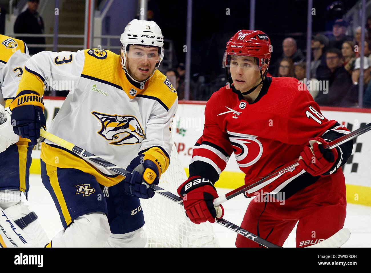 Carolina Hurricanes' Jack Drury (18) watches the puck along side ...