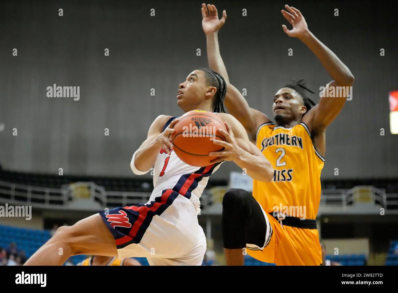 Mississippi guard Austin Nunez (1) attempts a layup while Southern ...