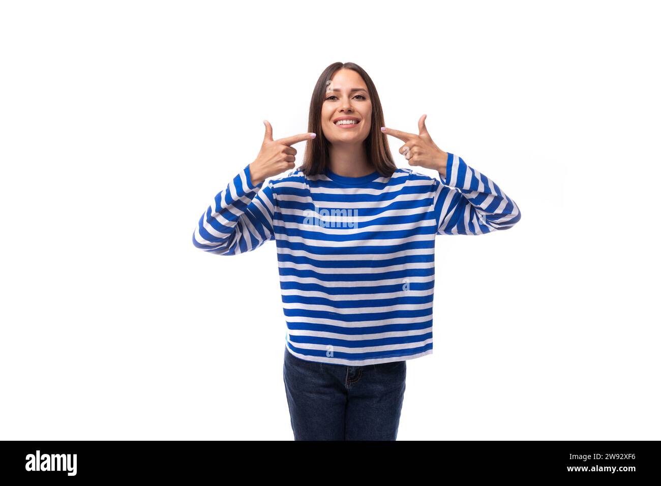 charming young slim european model woman wears striped blouse on white ...