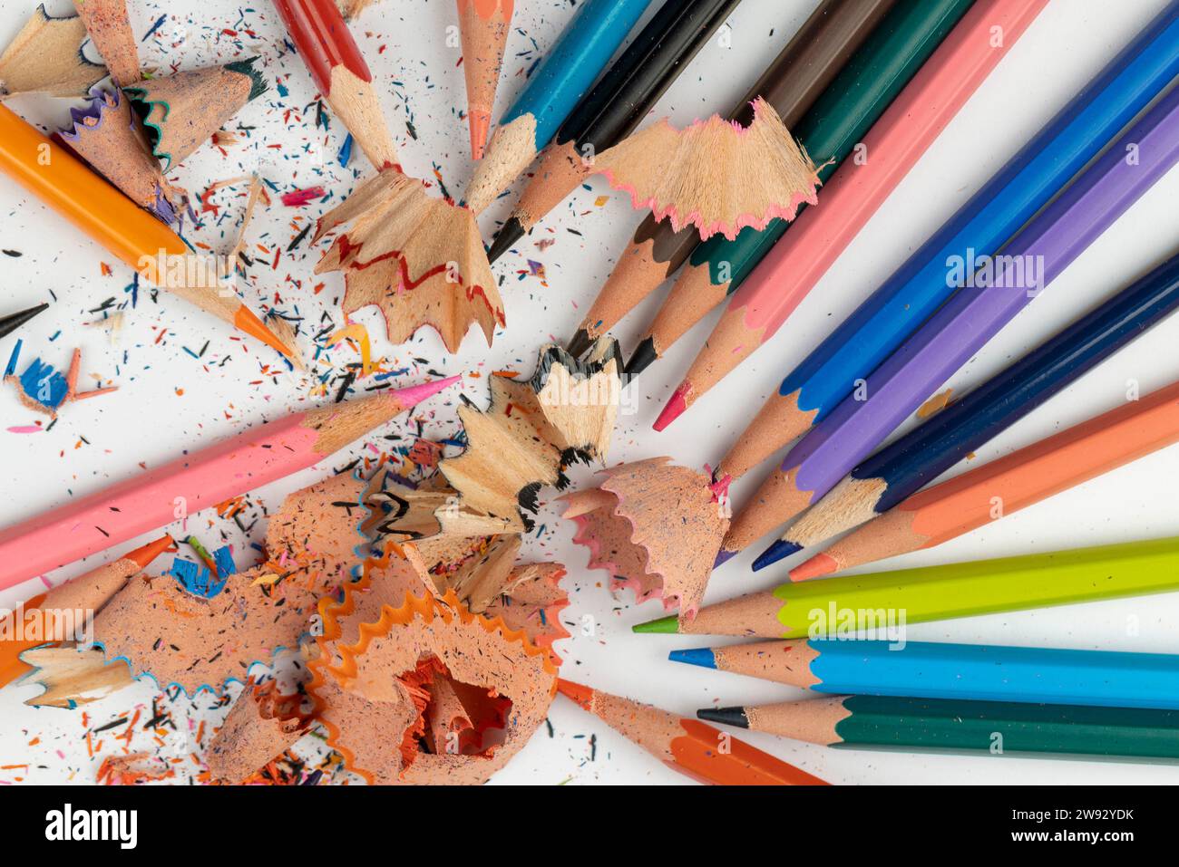sharp pencil of different colors on paper close-up , school supplies ...