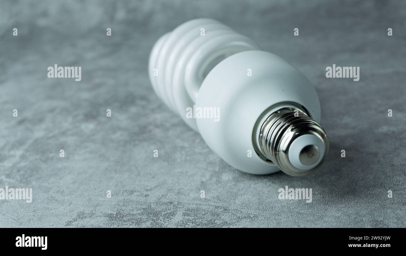 Spiral shaped bulbs on a gray background with concrete texture Stock ...
