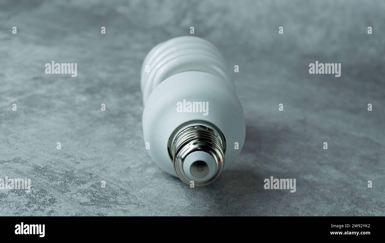 Spiral shaped bulbs on a gray background with concrete texture Stock ...