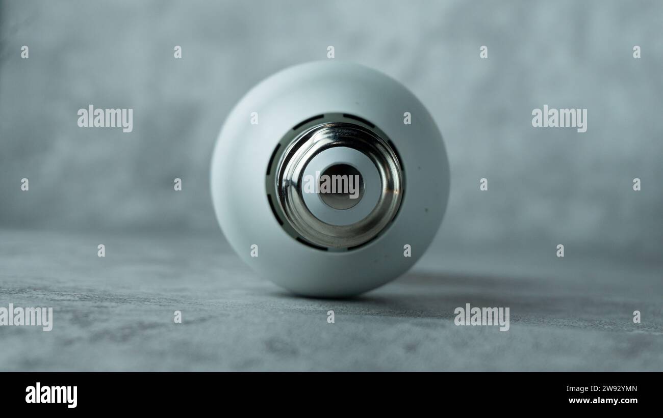 Spiral shaped bulbs on a gray background with concrete texture Stock ...