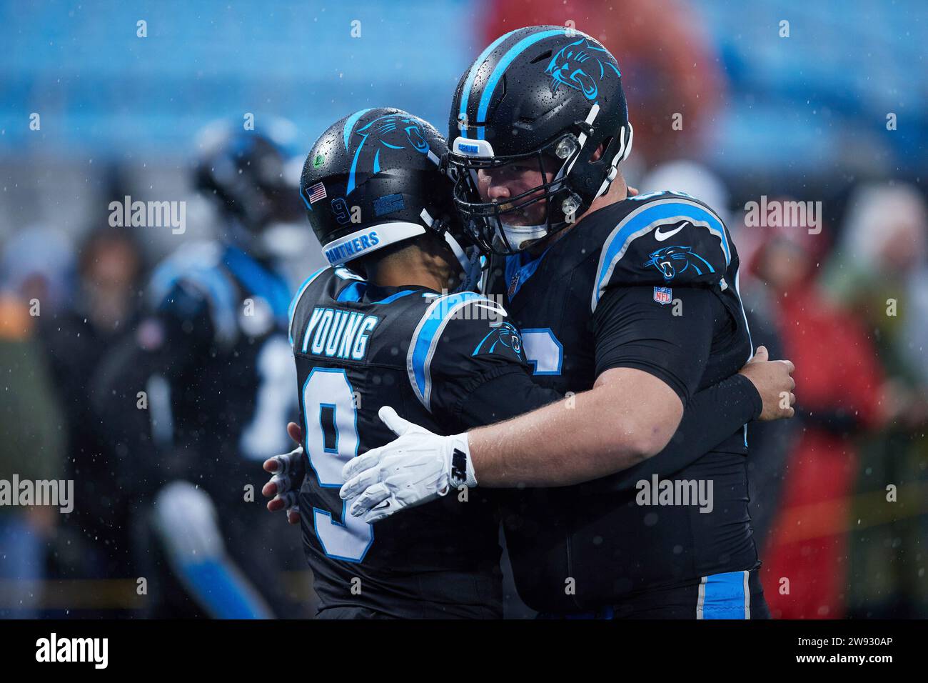 Carolina Panthers quarterback Bryce Young (9) gets a hug from center ...