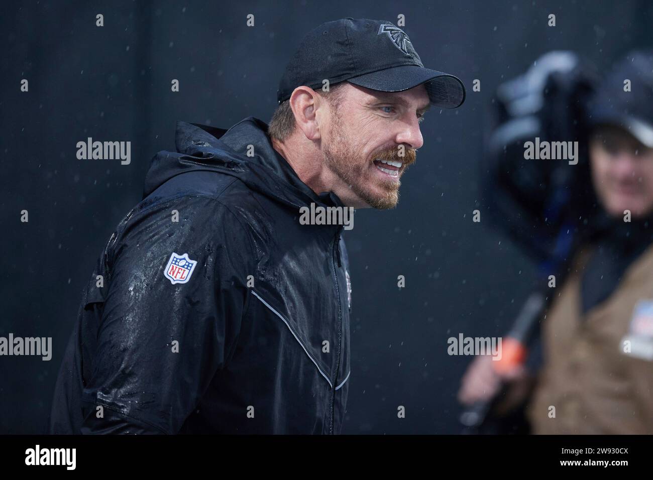 Atlanta Falcons defensive coordinator Ryan Nielsen works with the team during warm ups prior to ...