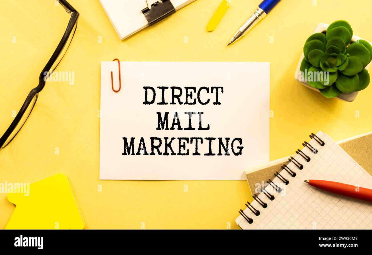 Direct Mail Marketing, text words typography written on book against ...